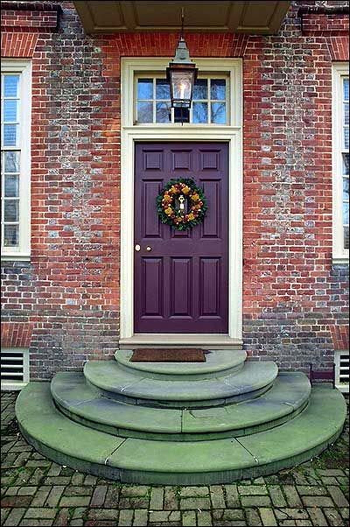 16 Stunning Front Door Colors That Enhance Brick Homes - Archeworks